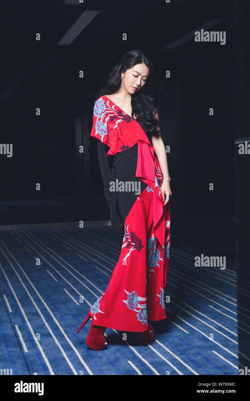 Hong Kong singer and actress Fiona Sit poses for photos during an ...