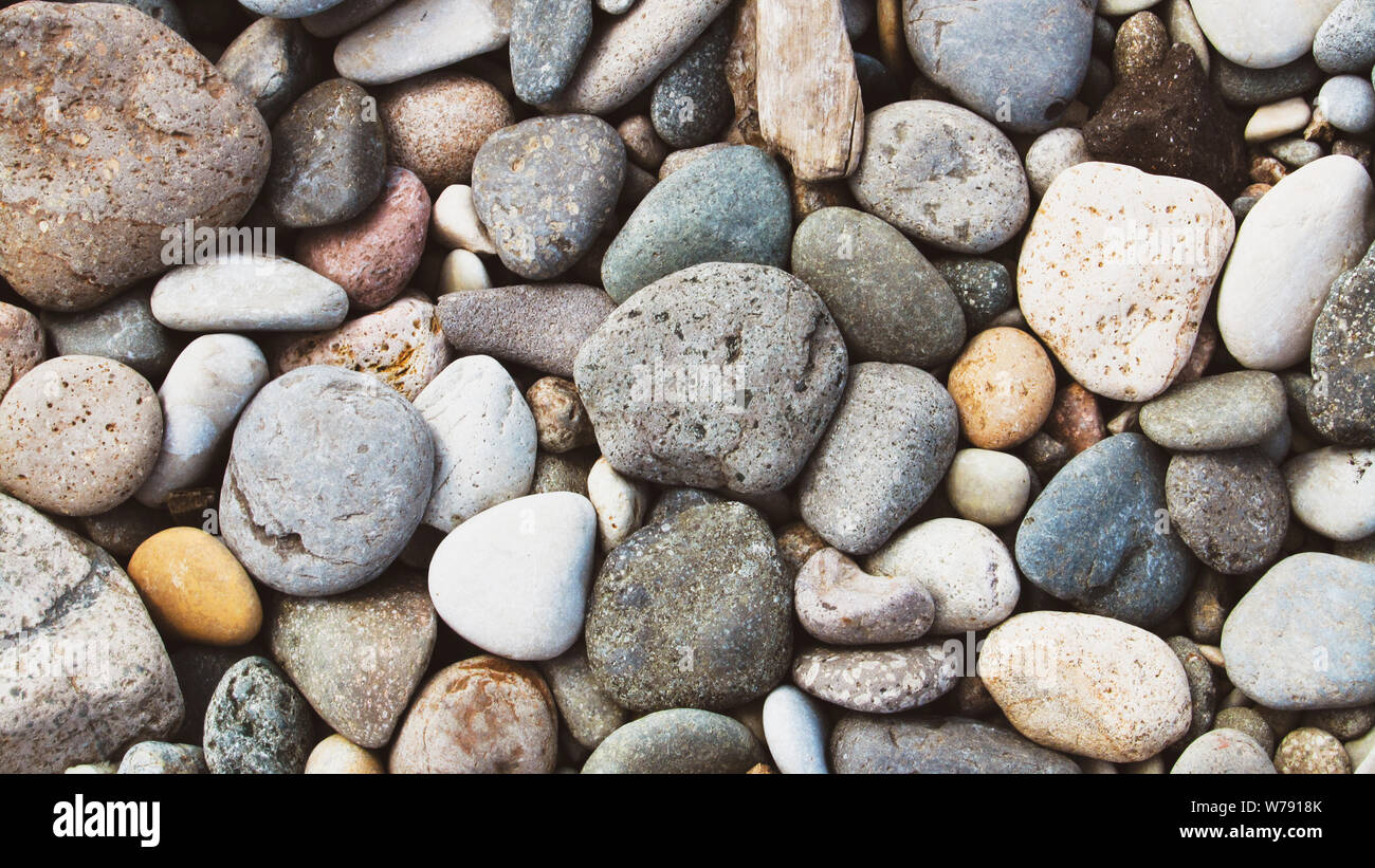 Pebble beach background, stone floor. Abstract nature pebbles ...