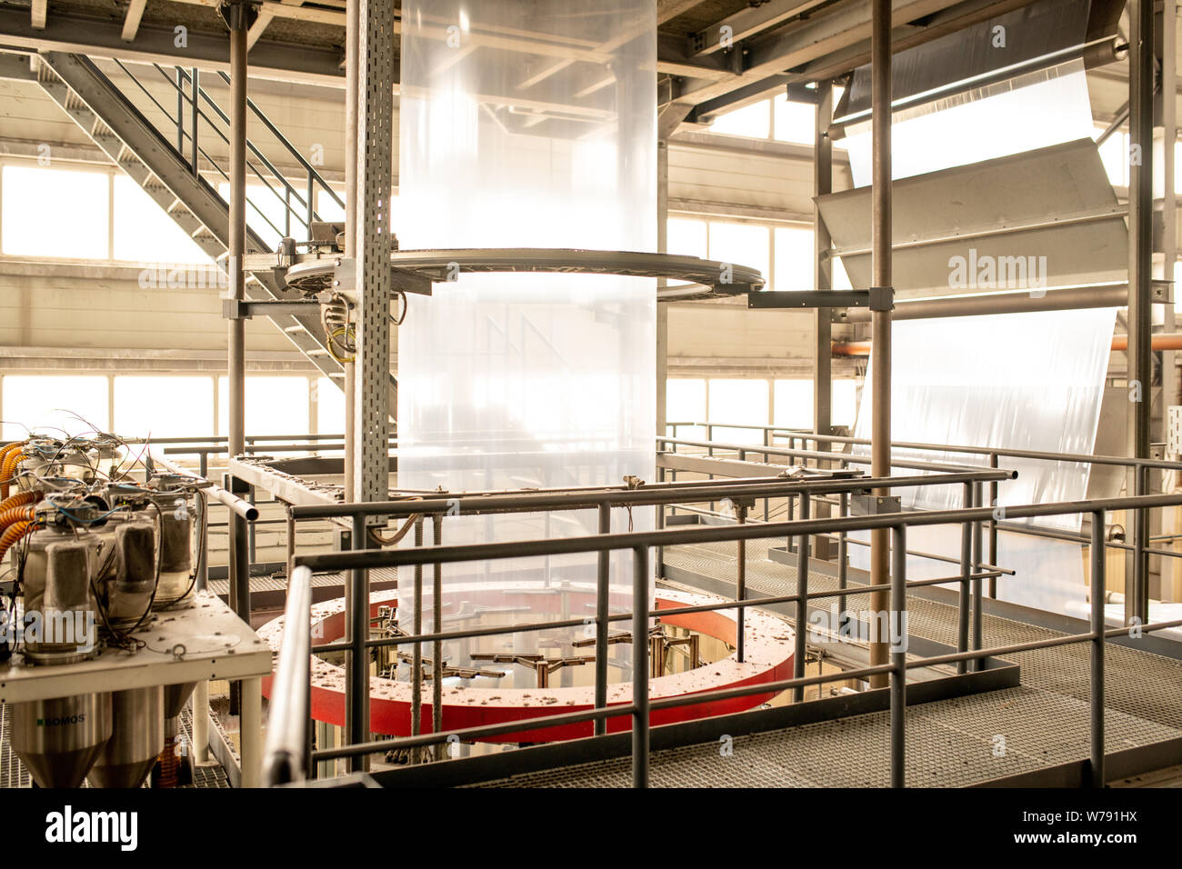 Workplace inside large modern manufacturing plant with processing ...