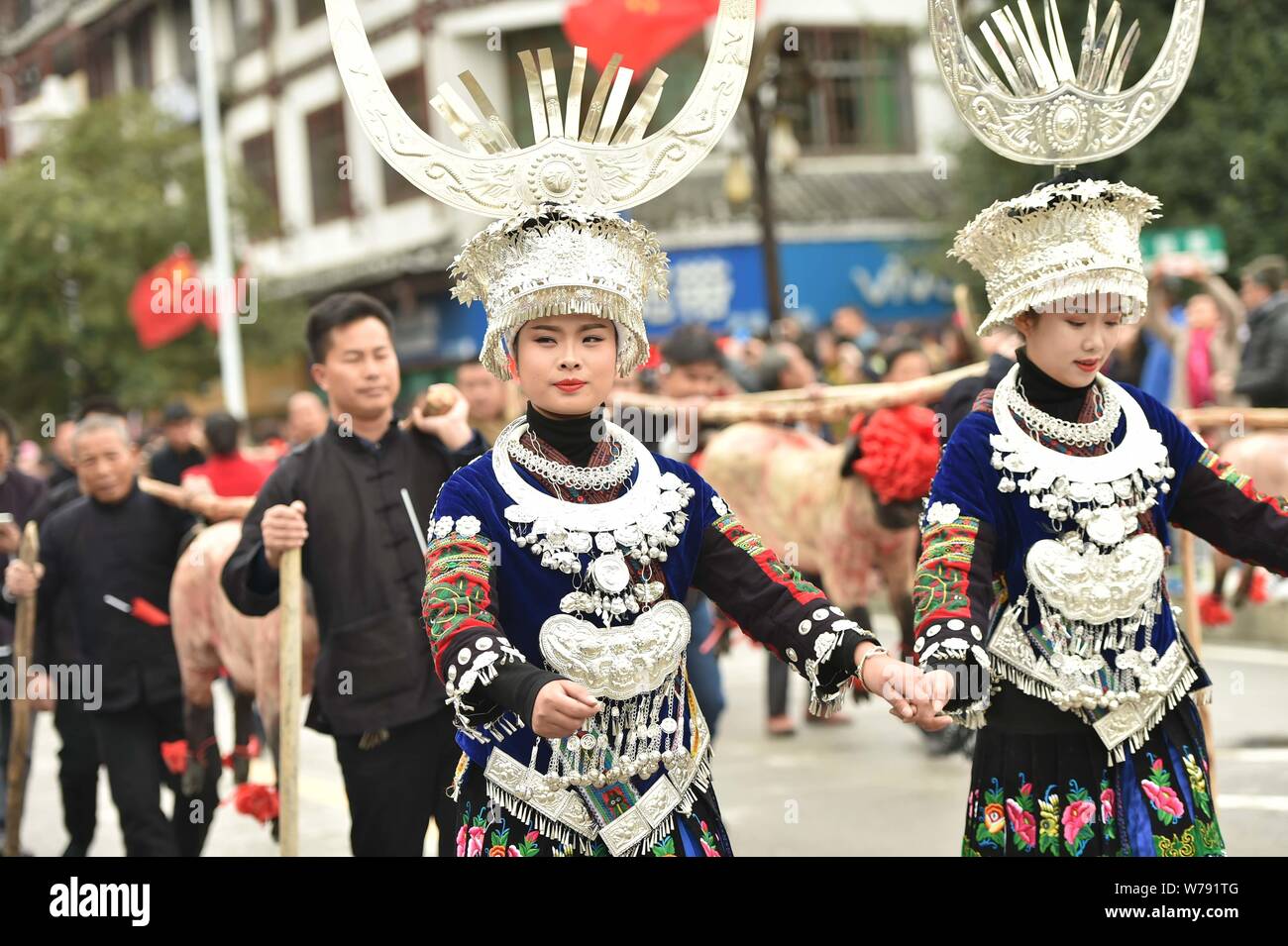 Chinese people of Miao ethnic minority dressed in traditional silver ...