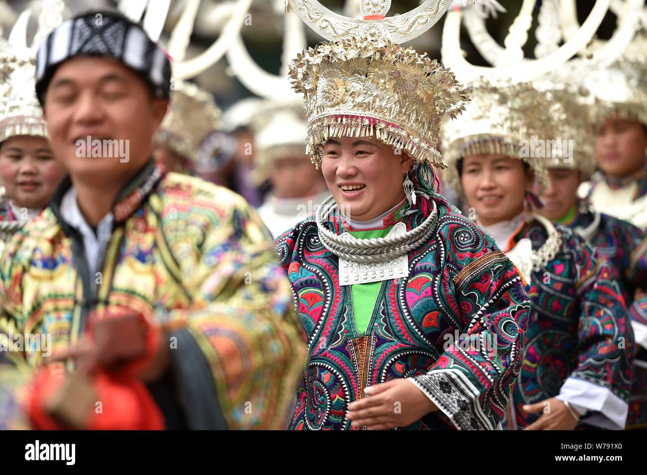 Chinese people of Miao ethnic minority dressed in traditional silver ...