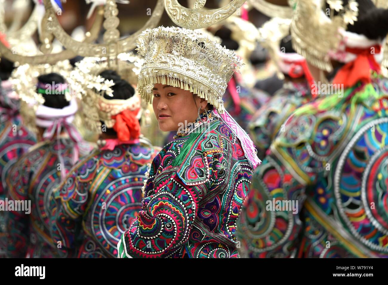 Chinese people of Miao ethnic minority dressed in traditional silver ...
