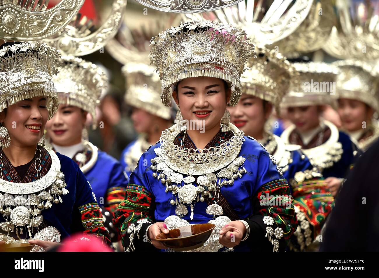 Chinese people of Miao ethnic minority dressed in traditional silver ...