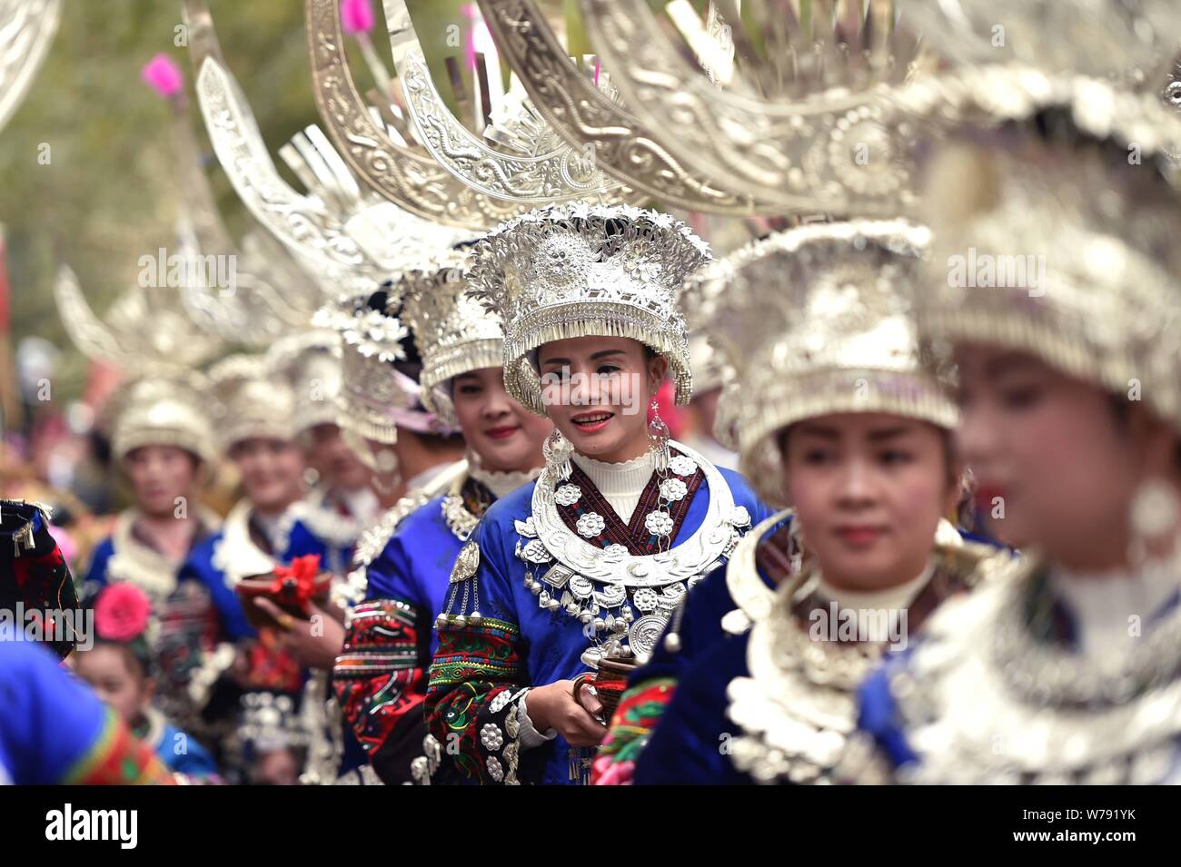 Chinese people of Miao ethnic minority dressed in traditional silver ...