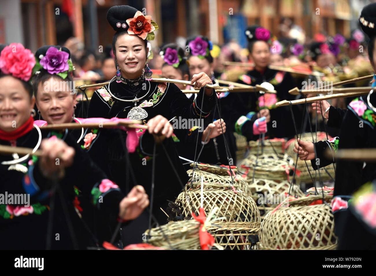 Chinese people of Miao ethnic minority dressed in traditional silver ...