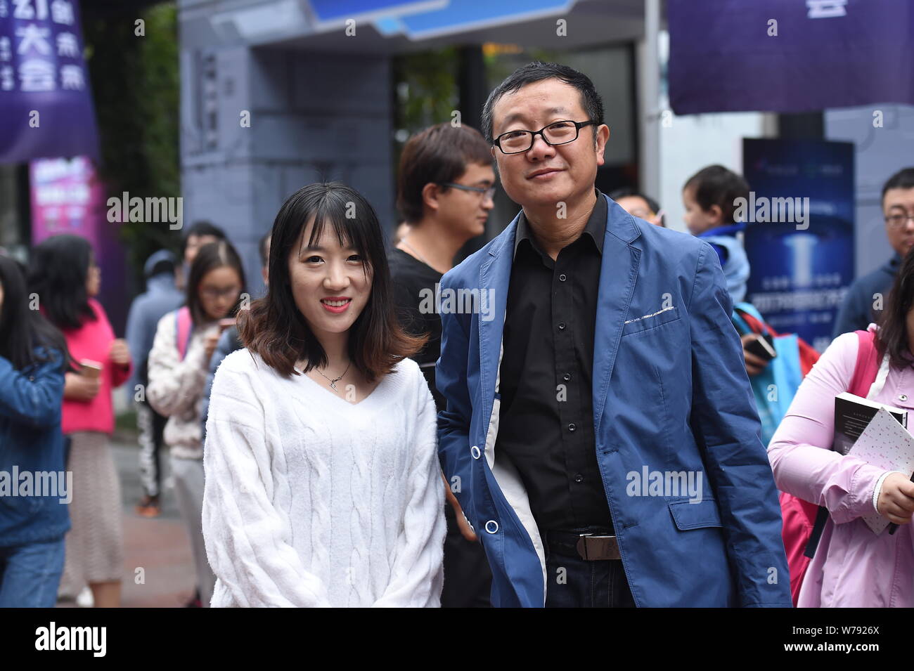 Chinese writer Liu Cixin, right, attends the 4th International Science ...