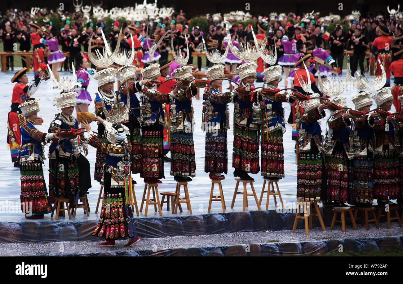 Chinese people of Miao ethnic minority dressed in traditional silver ...