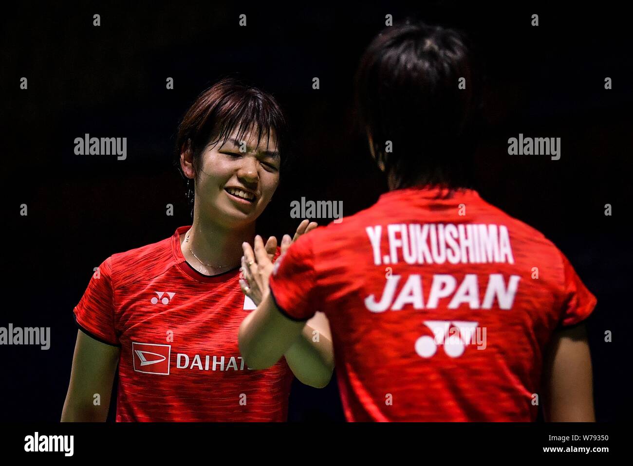 Fukushima Yuki and Sayaka Hirota of Japan interact with each other ...