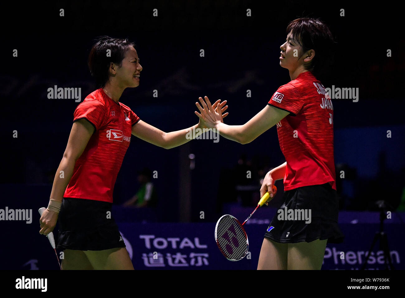 Fukushima Yuki and Sayaka Hirota of Japan interact with each other ...