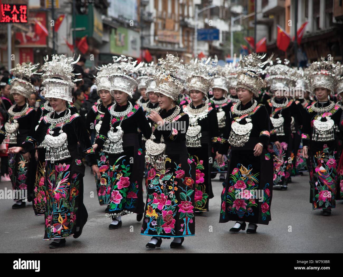 Chinese people of Miao ethnic minority dressed in traditional silver ...