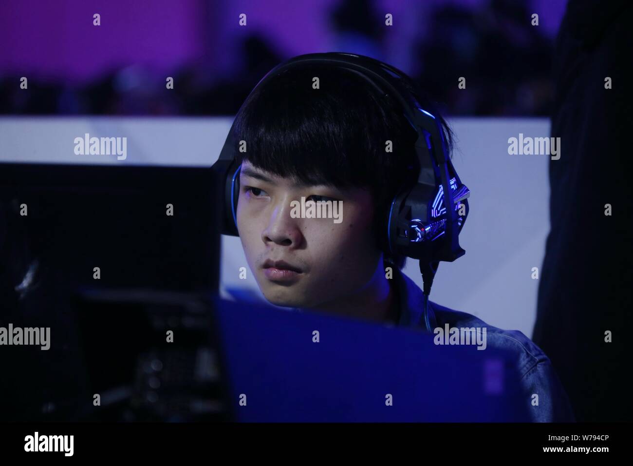 --FILE--A player of the online game, League of Legends (LOL) reacts as ...