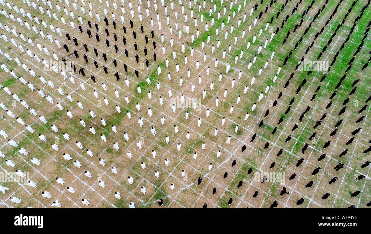 Aerial view of over 2,000 enthusiasts featuring the shape of Tai Chi ...