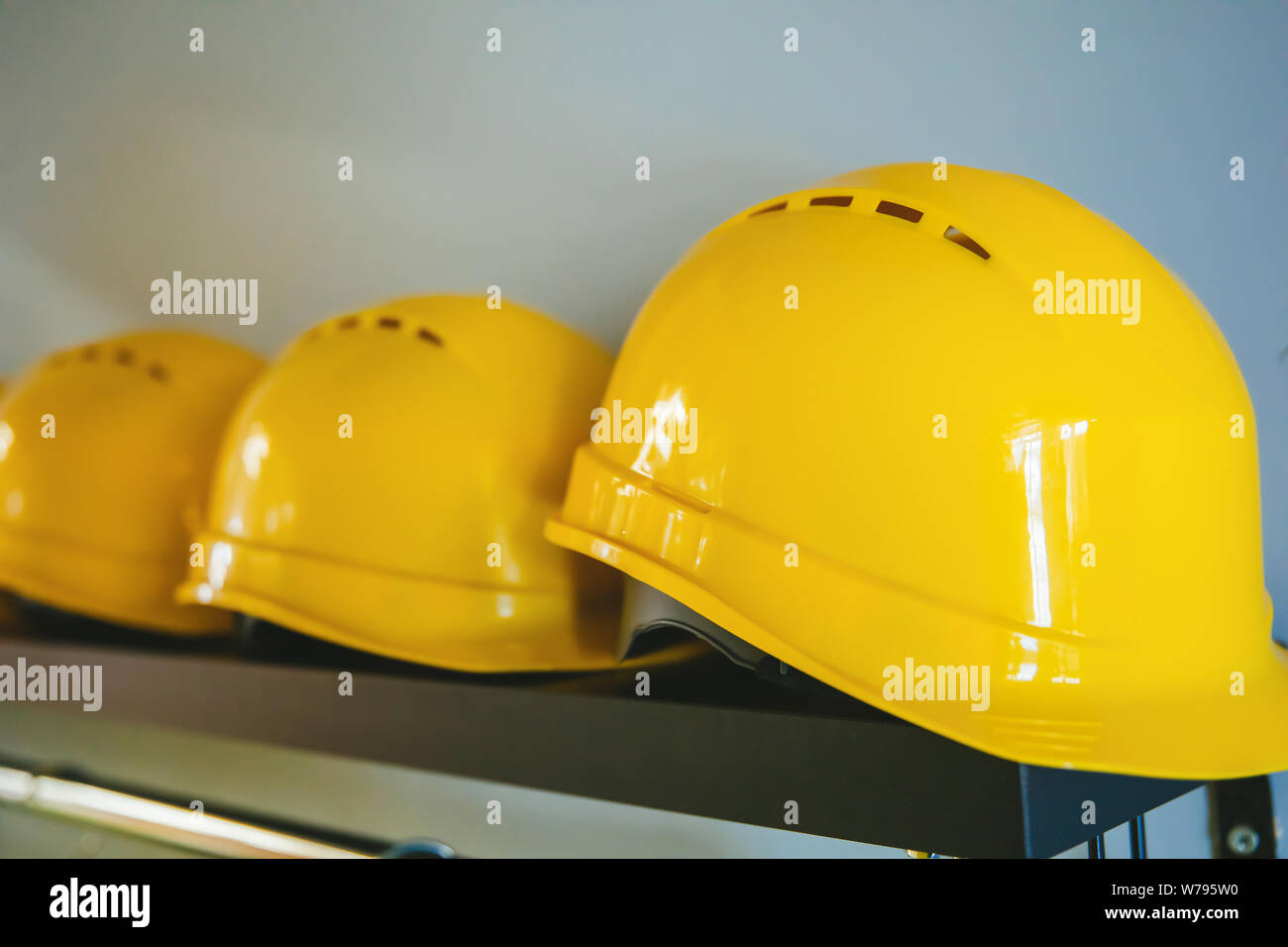 Yellow hard hat safety construction helmets. Job security protection ...