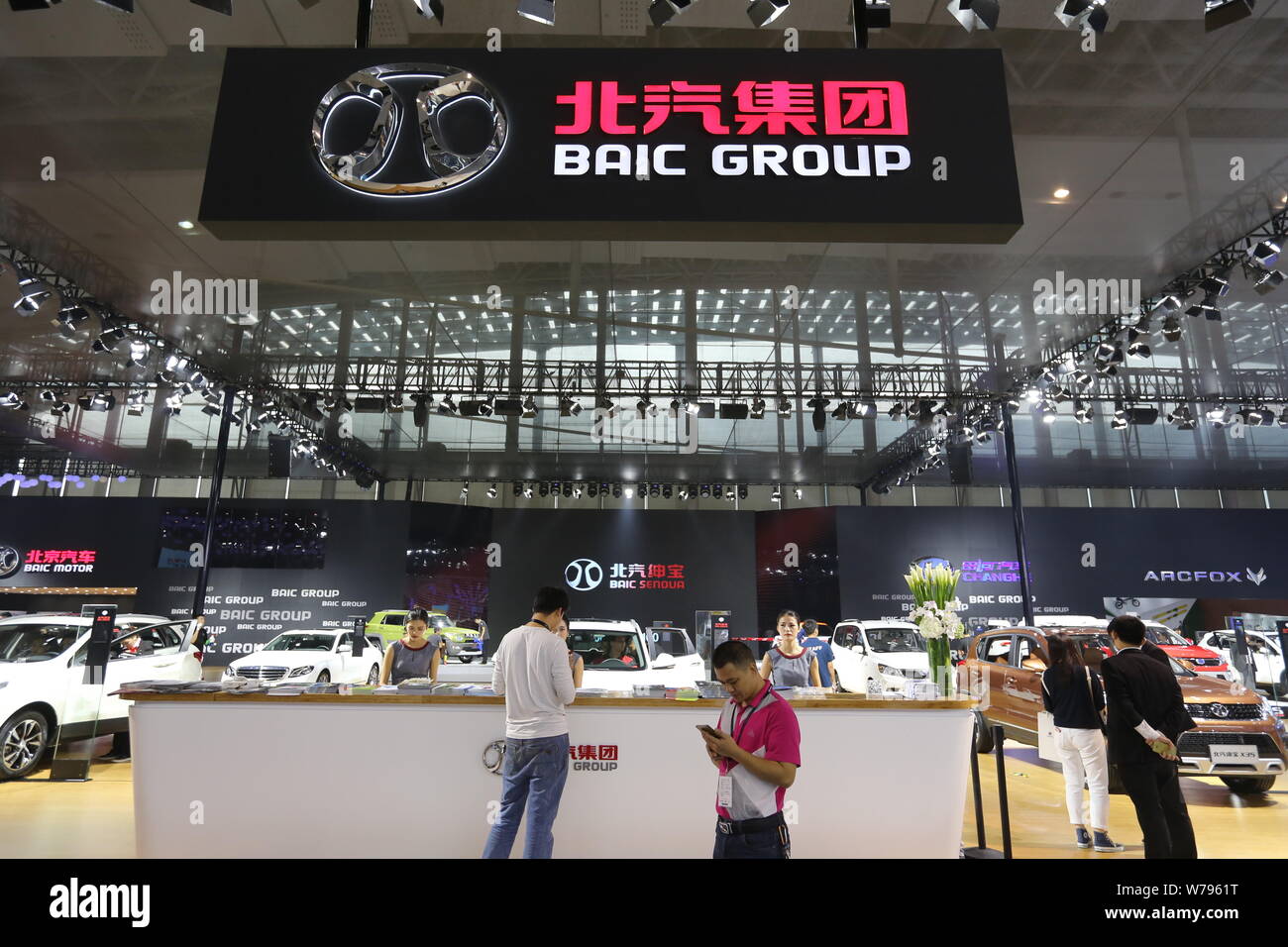 --FILE--People visit the stand of BAIC Group during an exhibition in ...