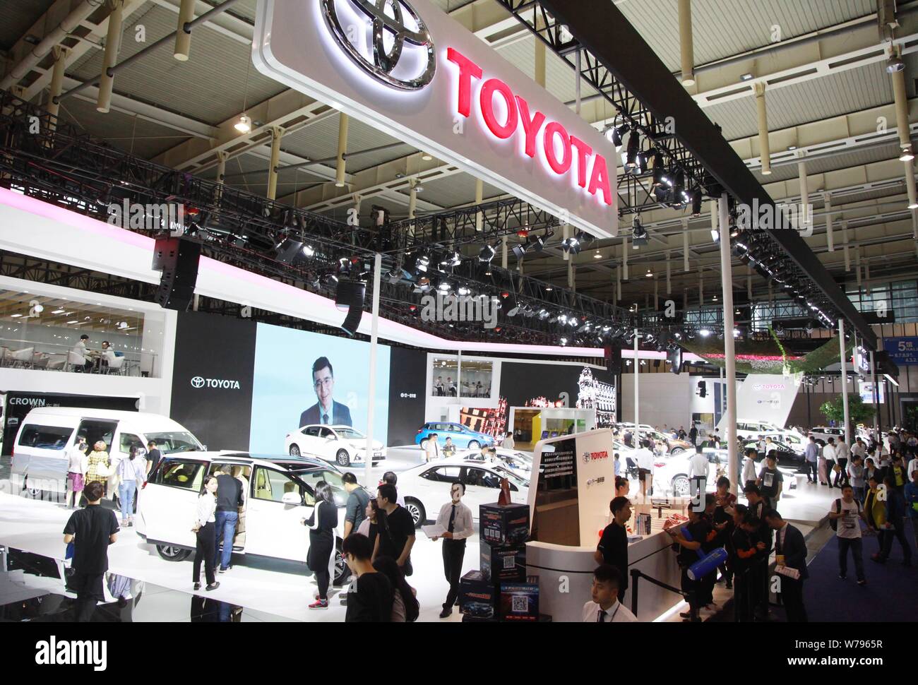 --FILE--People visit the stand of Toyota during an automobile ...