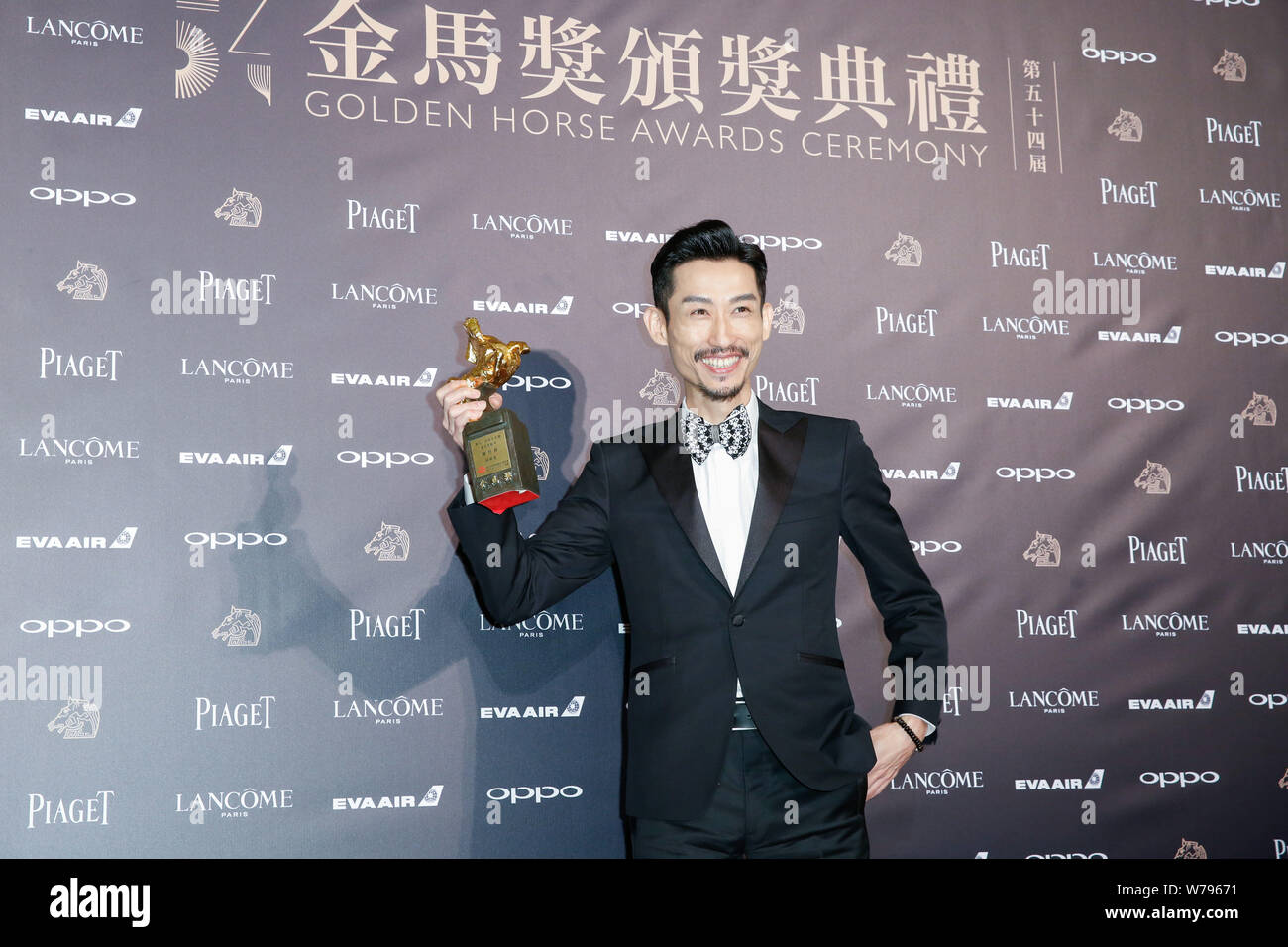 **TAIWAN OUT**Taiwanese actor Chen Chu-sheng poses with his trophy of ...
