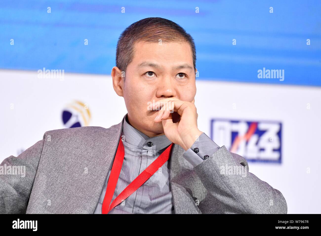 Ding Liguo, Chairman of Delong Holdings Ltd., attends the Caijing ...
