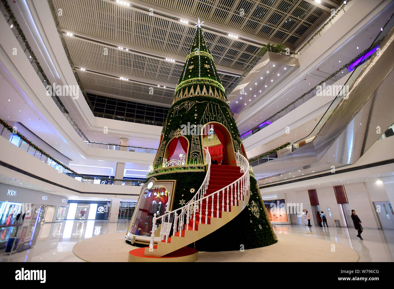A 40-meter-high Christmas tree art installation is displayed at a ...