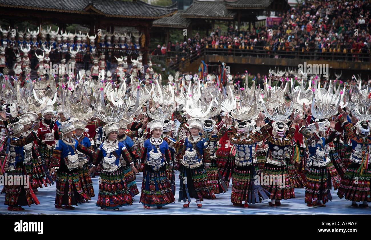 Chinese people of Miao ethnic minority dressed in traditional silver ...