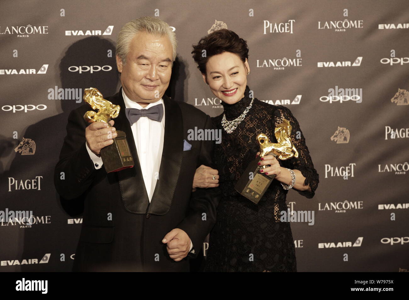 Hong Kong actress Kara Wai, right, and Chinese actor Tu Men pose with ...