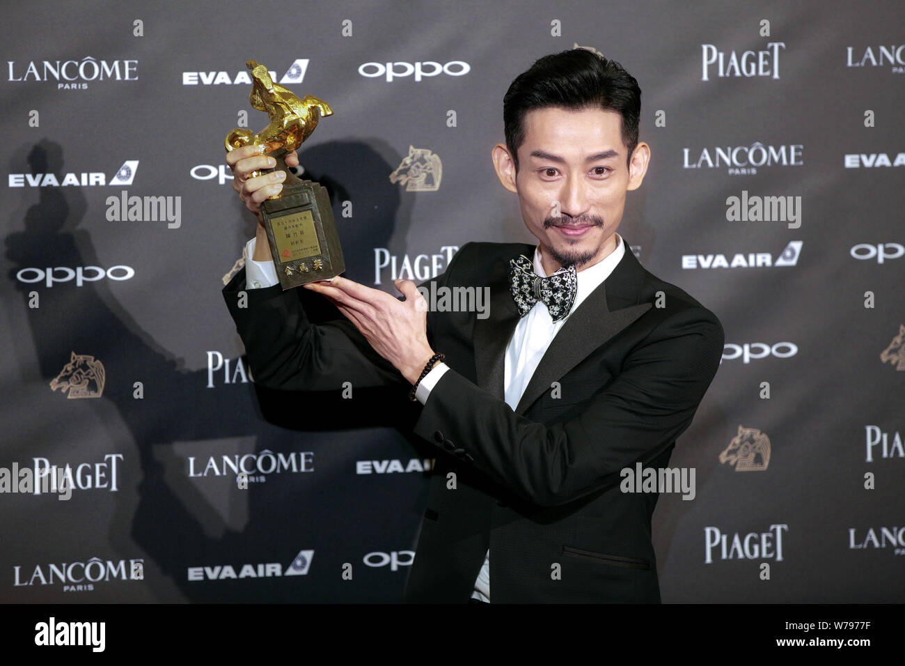 Taiwanese actor Chen Chu-sheng poses with his trophy of the Best ...