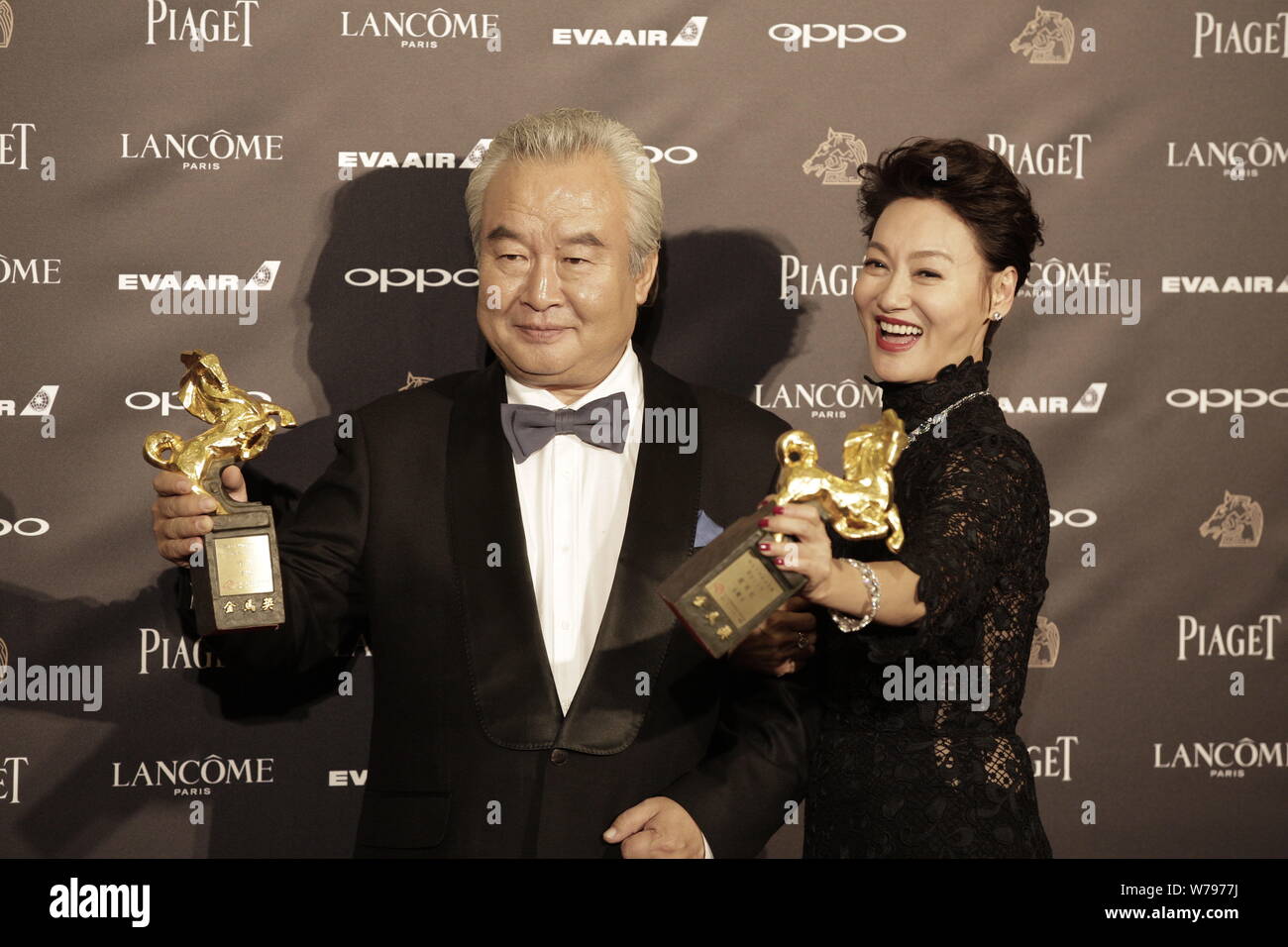 Hong Kong actress Kara Wai, right, and Chinese actor Tu Men pose with ...
