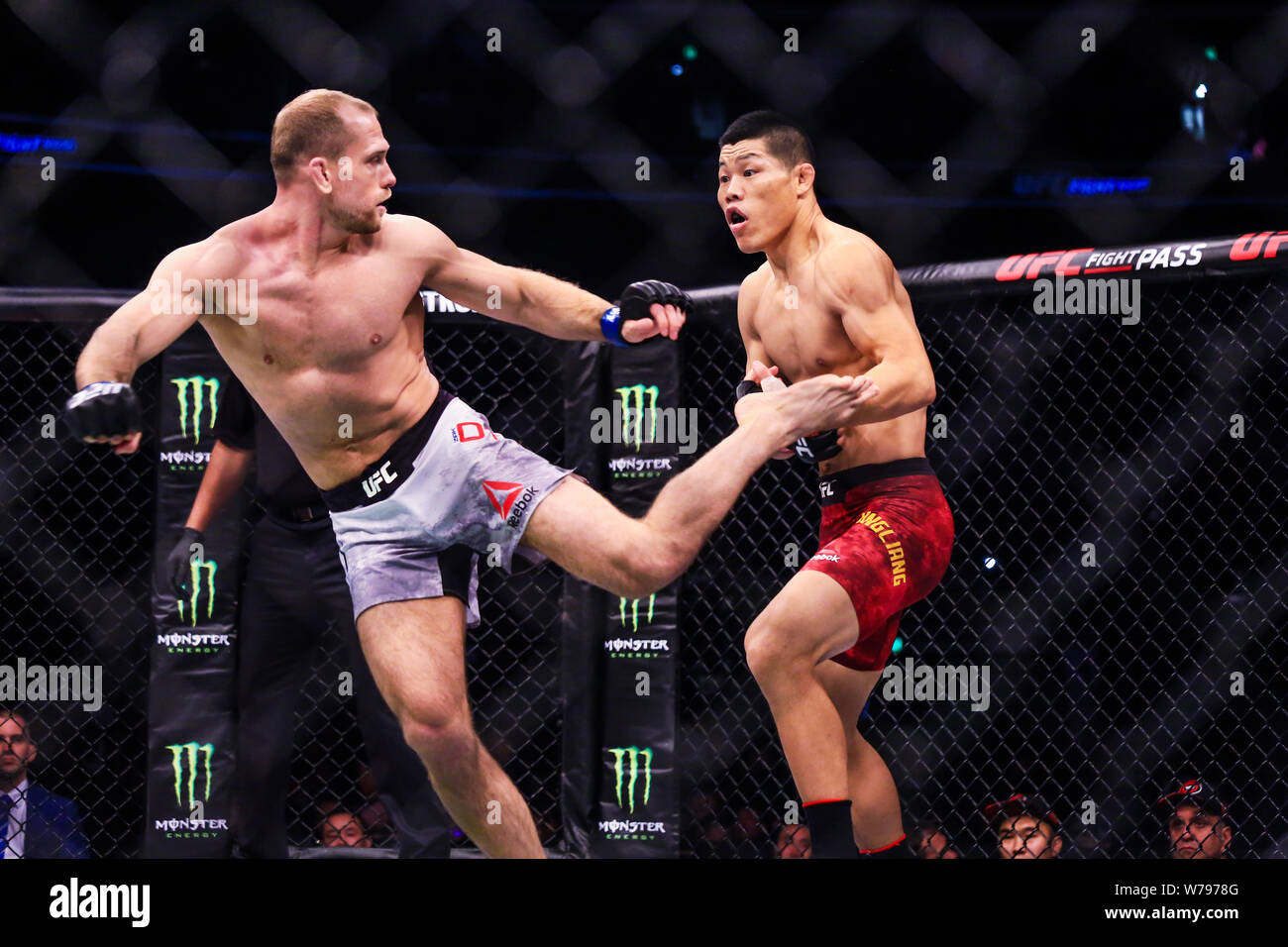 American mixed martial artist Zak Ottow, left, hits Chinese mixed ...