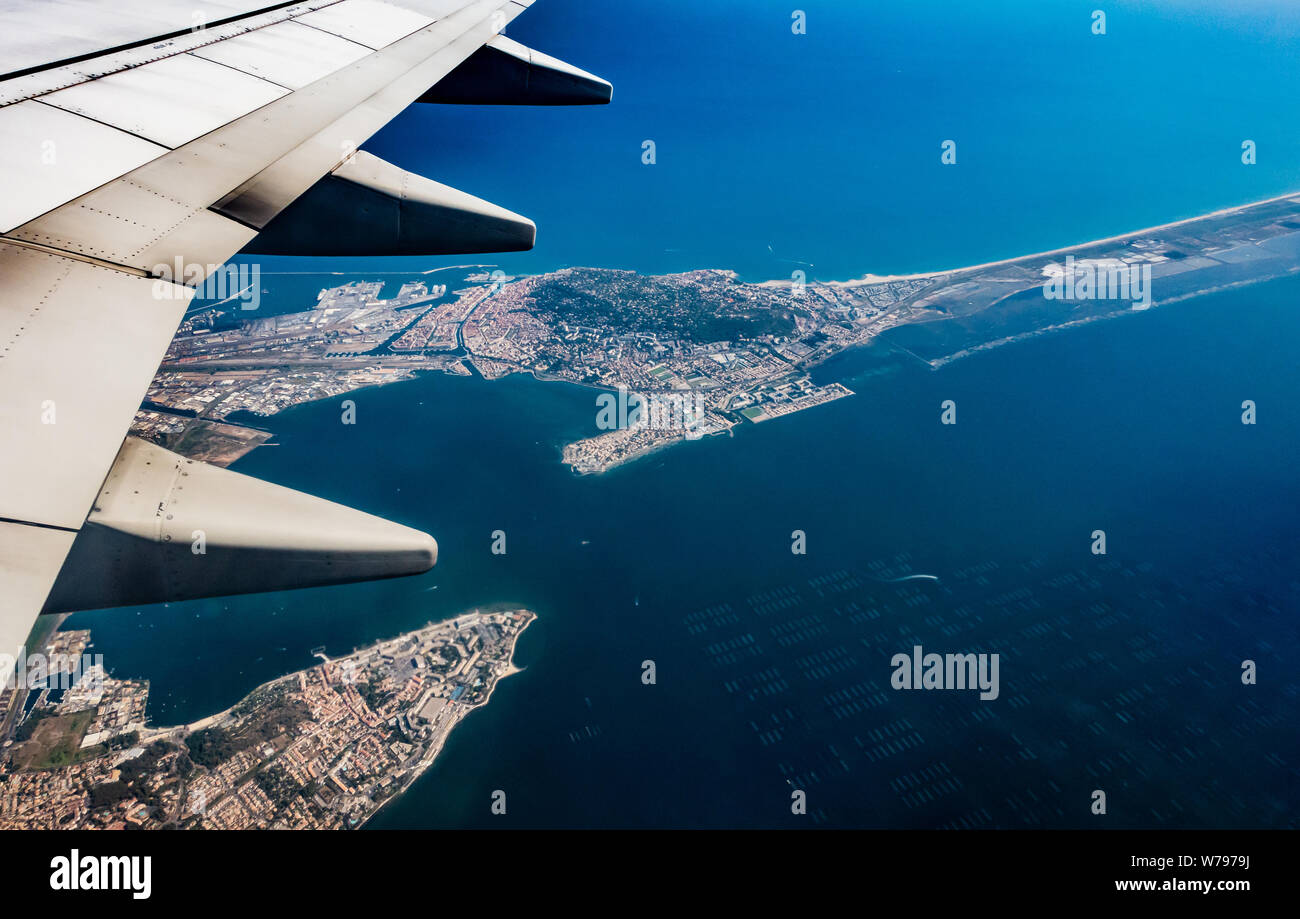 view of a Ryanair Boeing 737 - 800 wing out of plane window in flight ...