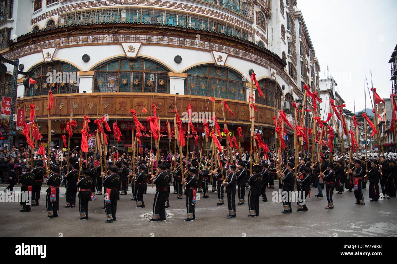 Chinese men of Miao ethnic minority group play the traditonal wind ...