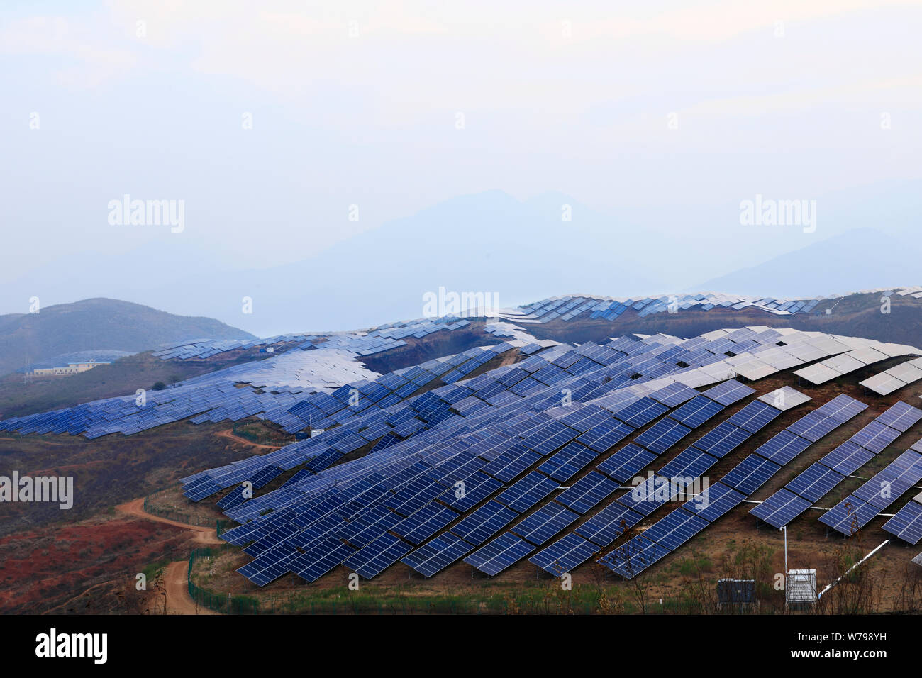 --FILE--Solar panels are installed at a photovoltaic (PV) power plant ...