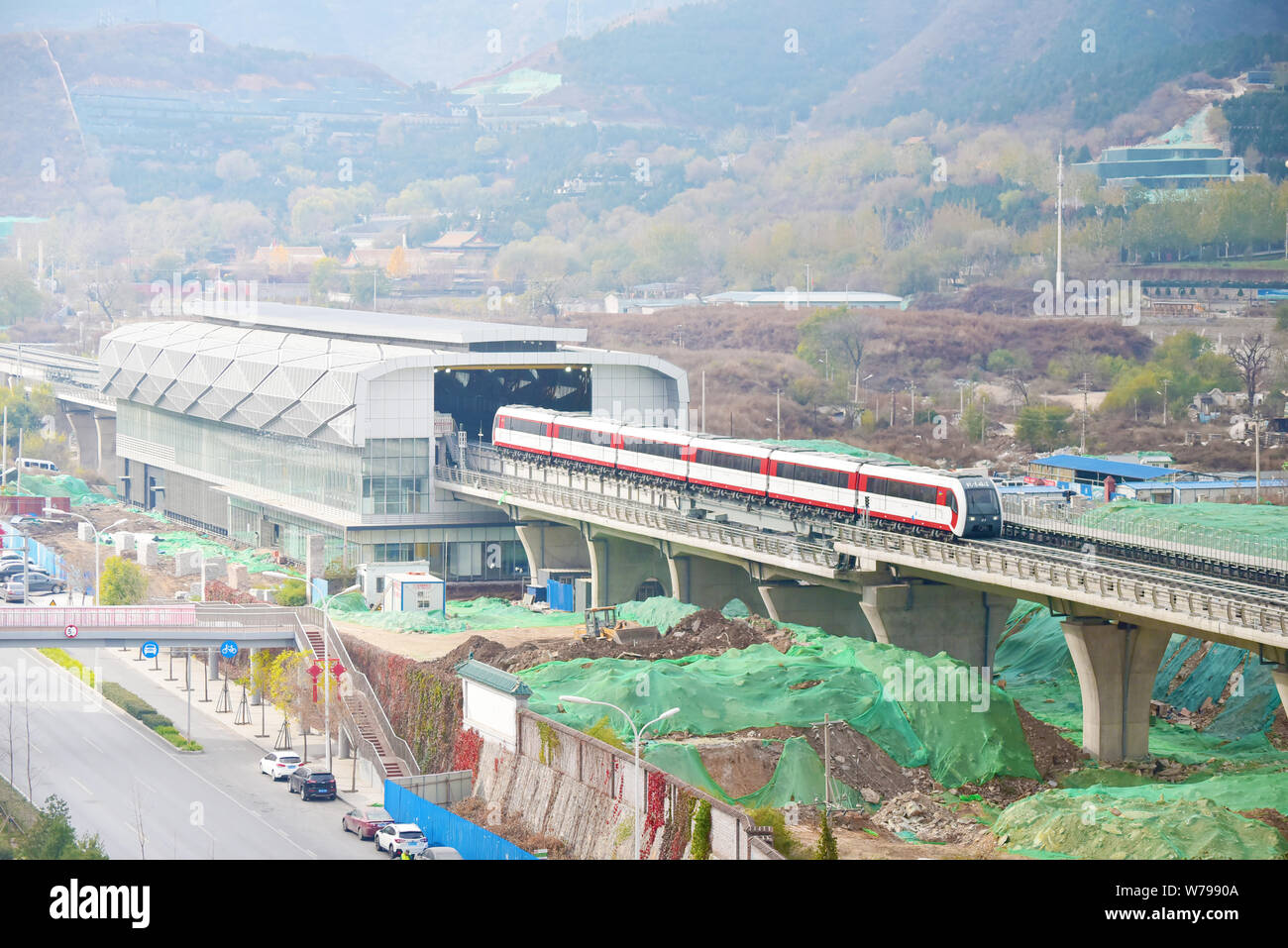 A maglev train runs on Beijing's first medium-low speed maglev S1 line ...