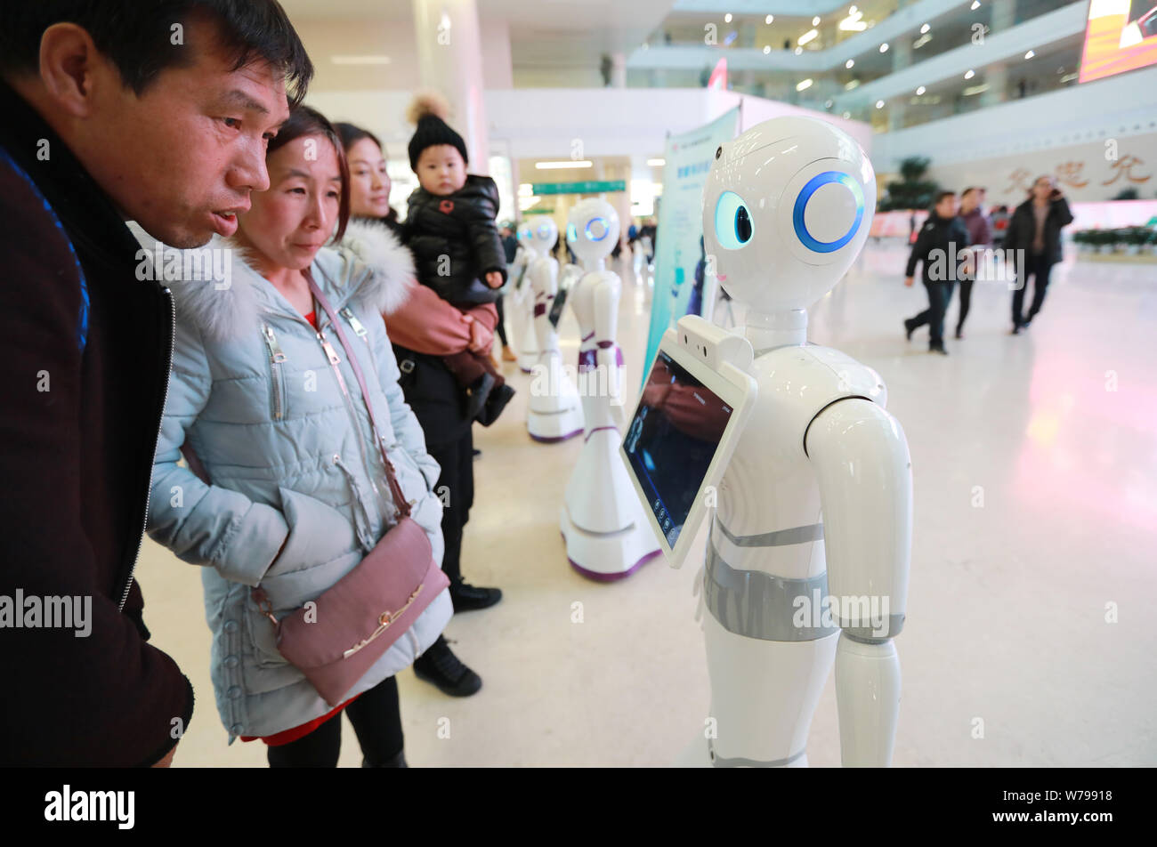 A robot provides information for visitors at Chinese PLA General ...
