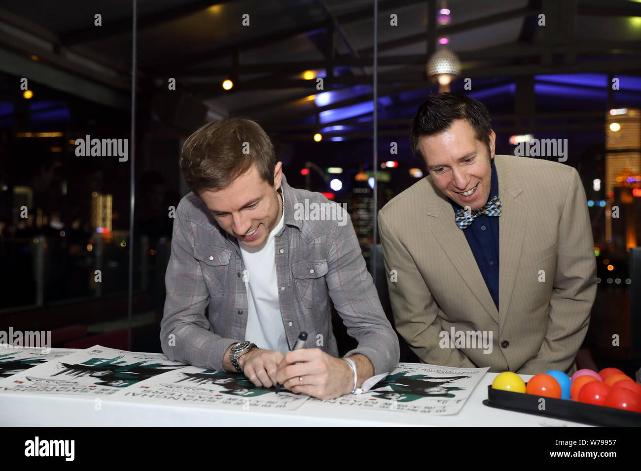 Dominic Dale of Wales, second right, attends a reception party for the ...