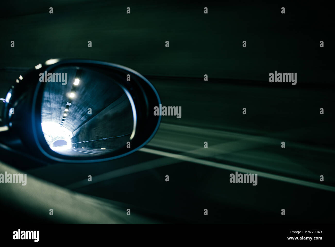 Oval mirror car reflection inside a tunnel road Stock Photo - Alamy