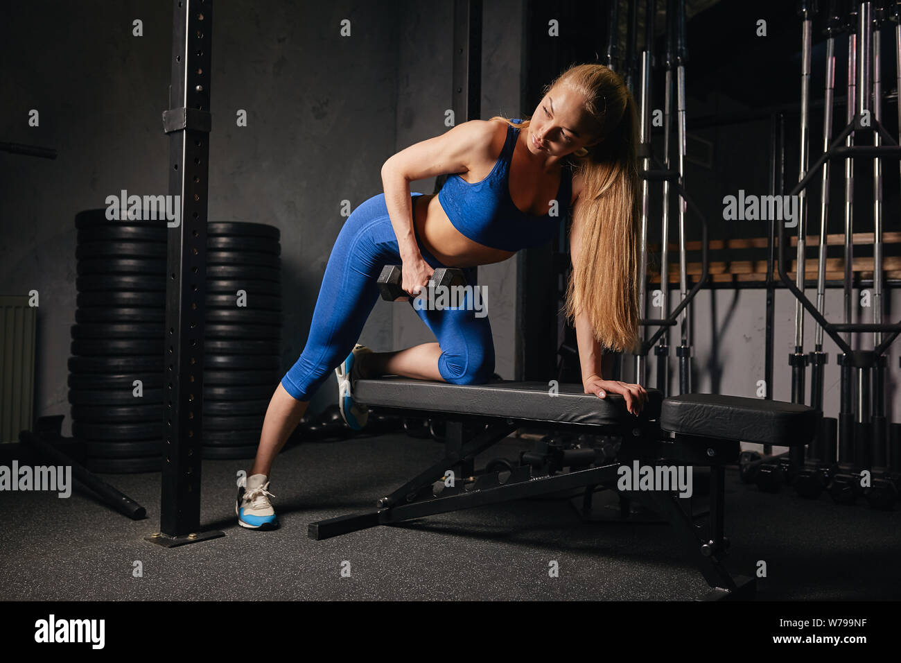 beautiful well-built girl in fashion stylish sportswear training at the ...