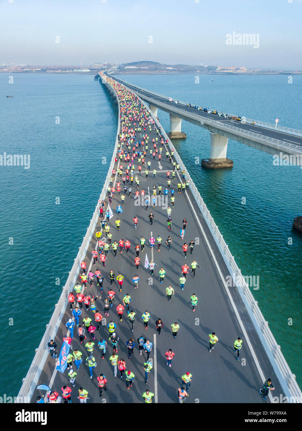 Participants compete in the world's first marathon on the sea on ...