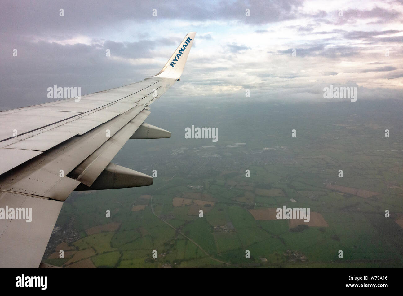 Wing on a Ryanair Boeing 737 - 800 entering british airspace on route ...
