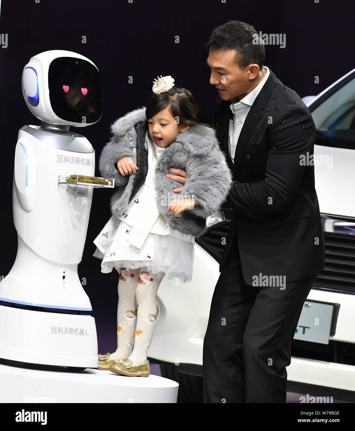 Taiwanese singer and actor Will Liu and his daughter Eve are pictured ...