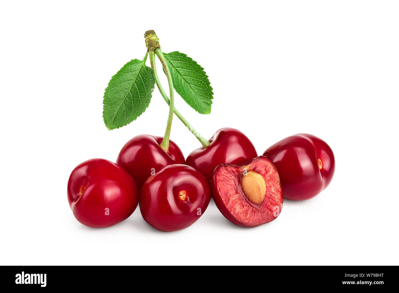 Some cherries with leaf and cut closeup isolated on white background ...