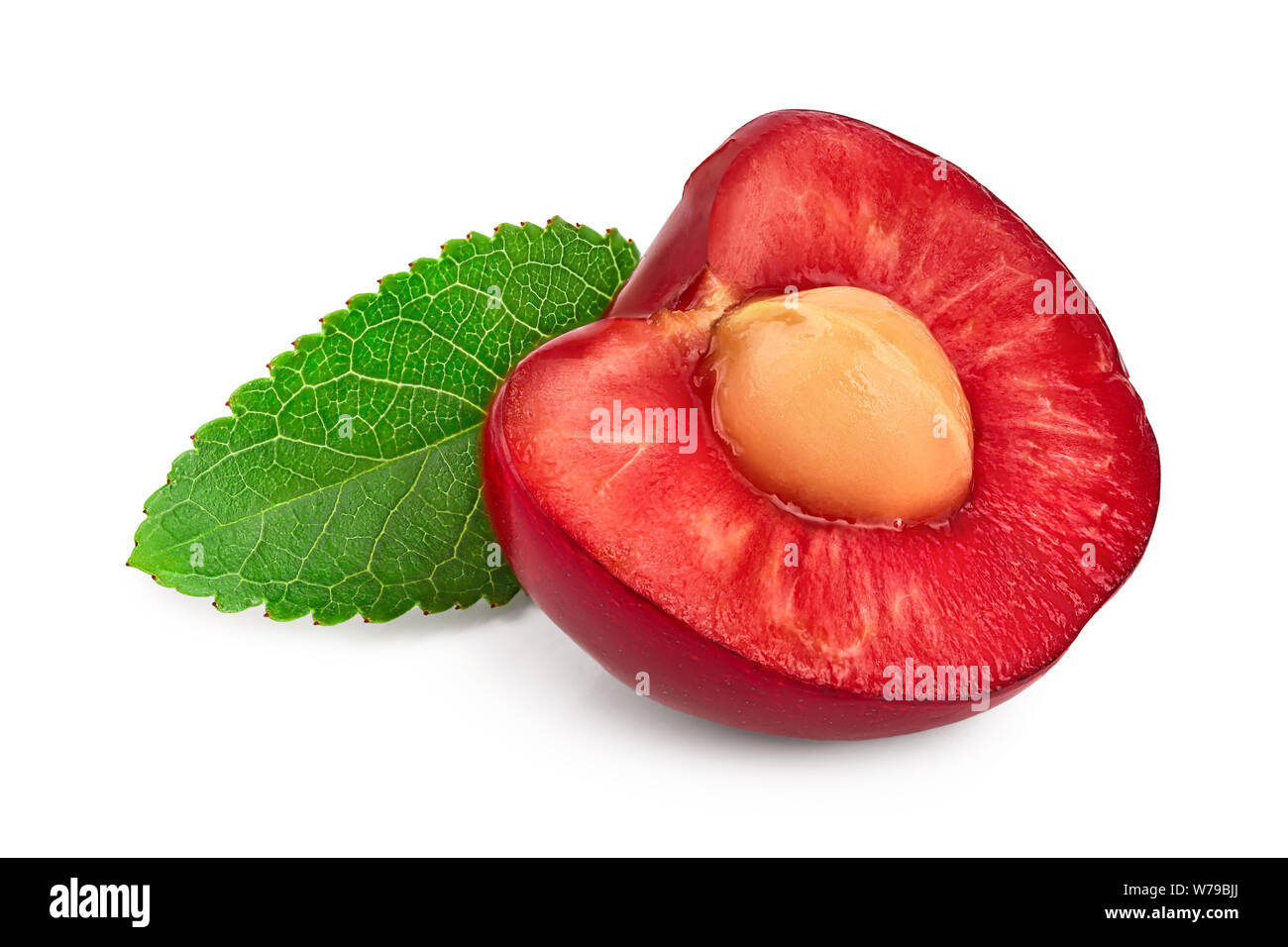 half cherry with leaf closeup isolated on white background Stock Photo ...