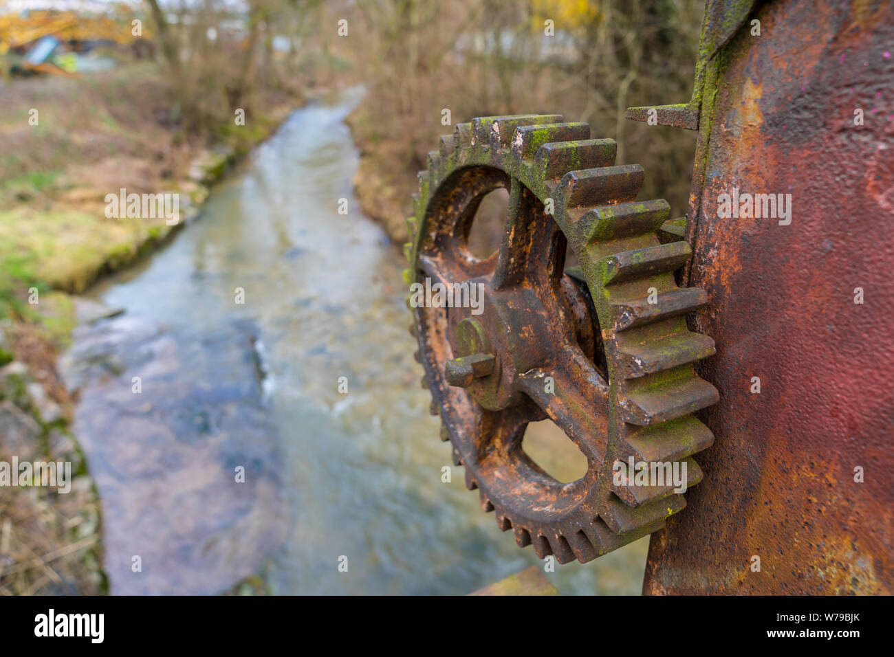 Old rusty gear wheel at a river dam for electrical energy Stock Photo ...