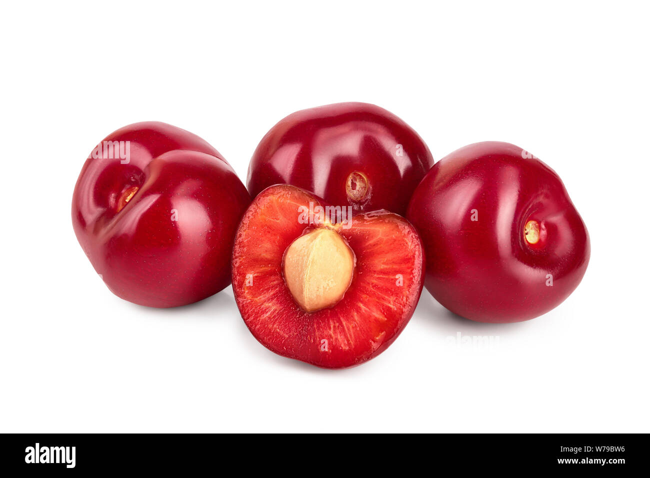 cherry with half closeup isolated on white background Stock Photo - Alamy