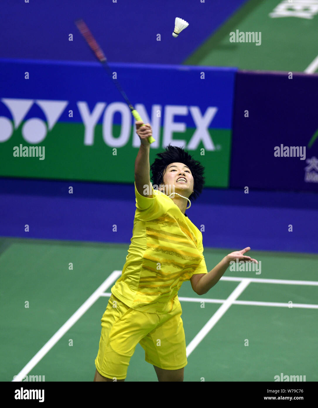 Yip Pui Yin of Hong Kong returns a shot to Sung Ji-hyun of South Korea ...