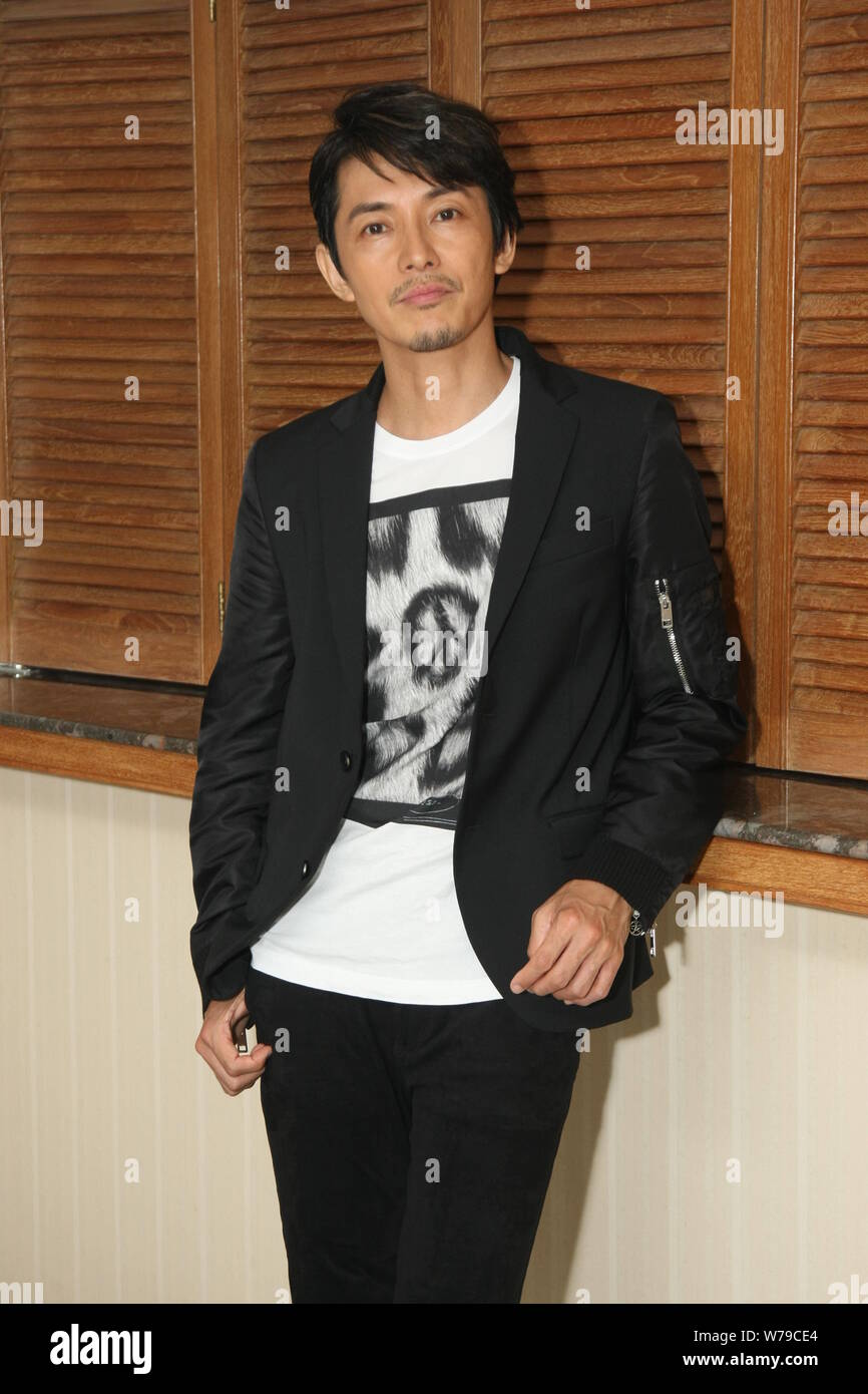 Japanese actor and singer Naohito Fujiki receives an interview in Hong Kong, China, 14 November ...