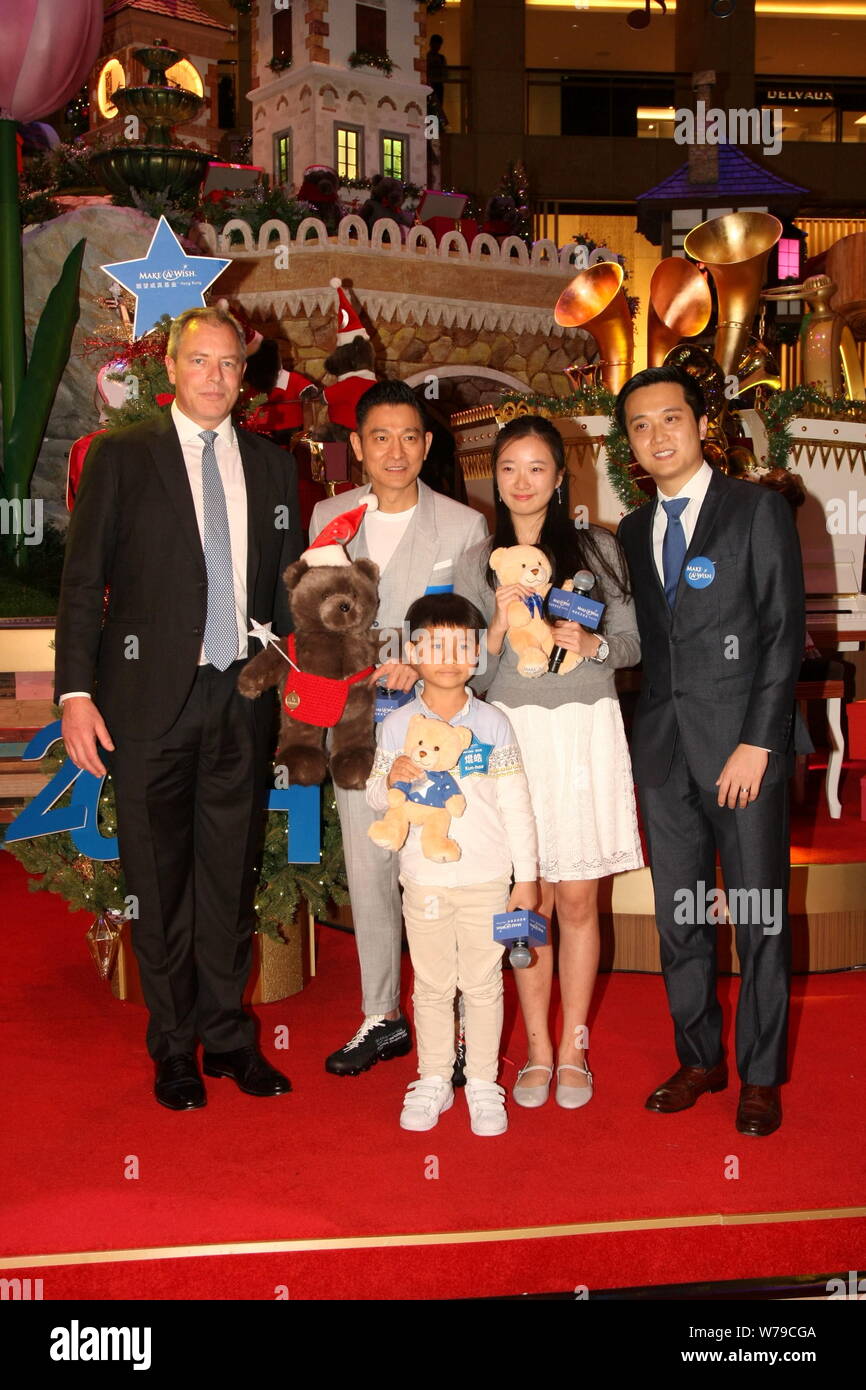 Hong Kong actor Andy Lau, second left, attends a charity event for the ...