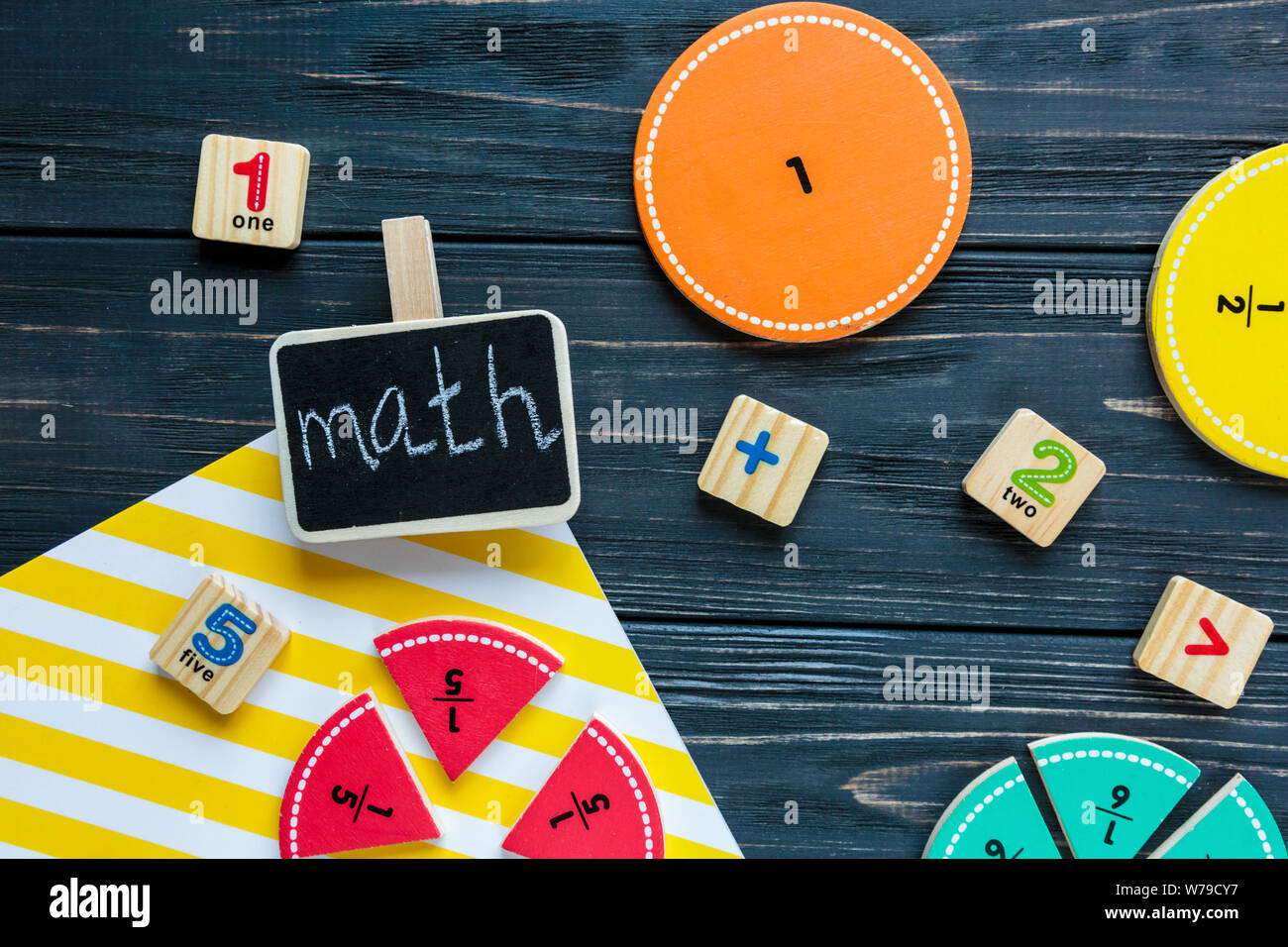 Creative Сolorful math fractions on dark background. Interesting funny ...