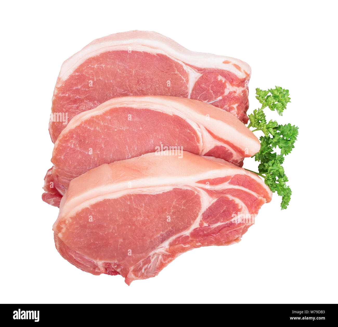 sliced raw pork meat with parsley isolated on white background. Top ...