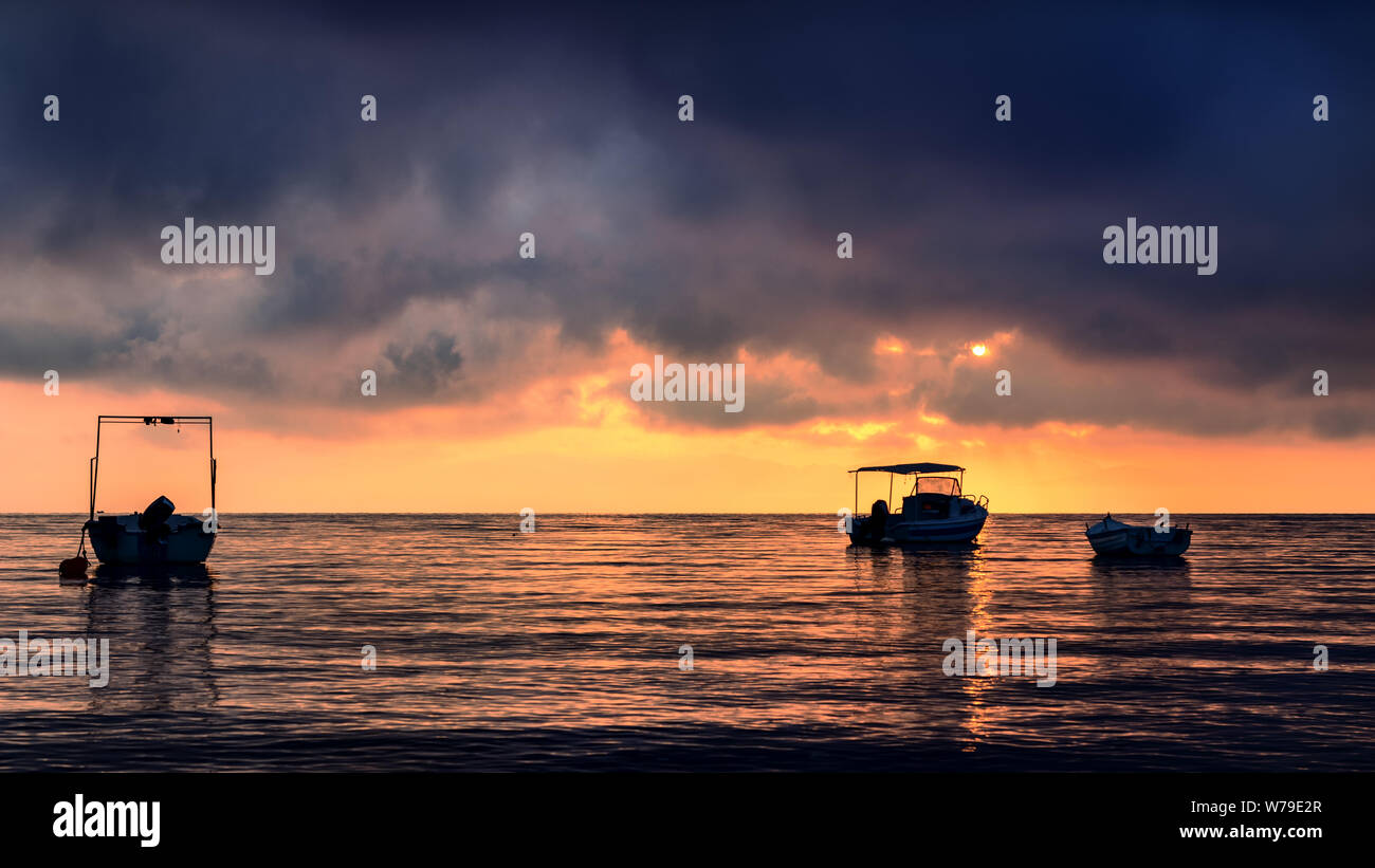 Sunrise with dramatic clouds hi-res stock photography and images - Alamy