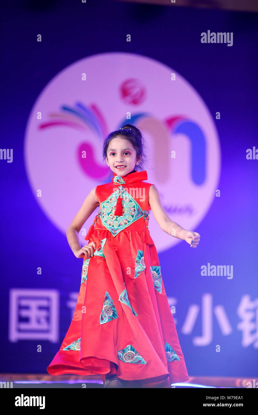 A child model displays a creation at a children model contest in Jimo ...