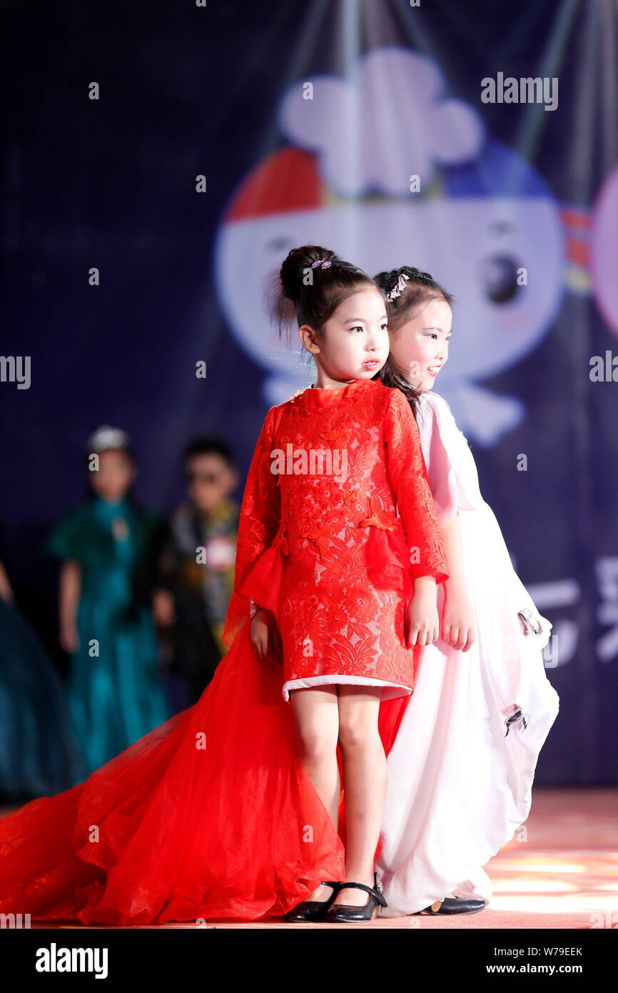 A child model displays a creation at a children model contest in Jimo ...